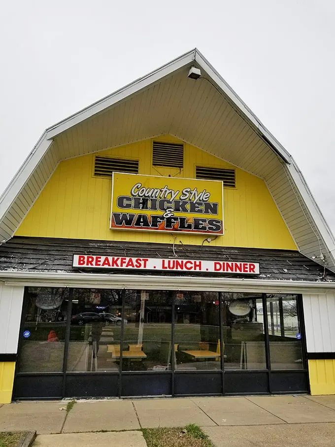 The sunshine-yellow barn exterior isn't just eye-catching—it's a beacon of comfort food promise that practically screams "get in here and eat something wonderful!"