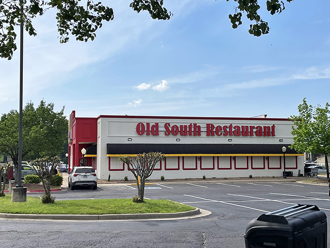 The bright red facade of Old South Restaurant stands like a beacon of comfort food salvation along the highway, promising delicious redemption for hungry travelers.