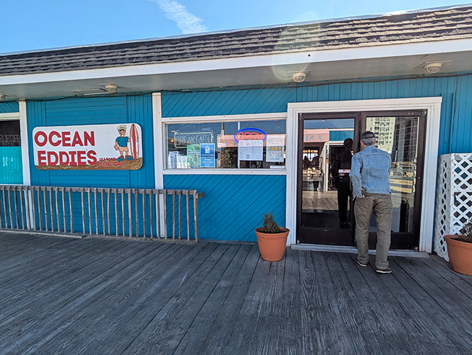 The cheerful blue exterior of Ocean Eddies welcomes seafood lovers like a maritime hug, complete with bicycles parked outside—transportation for locals who know where the good stuff is.