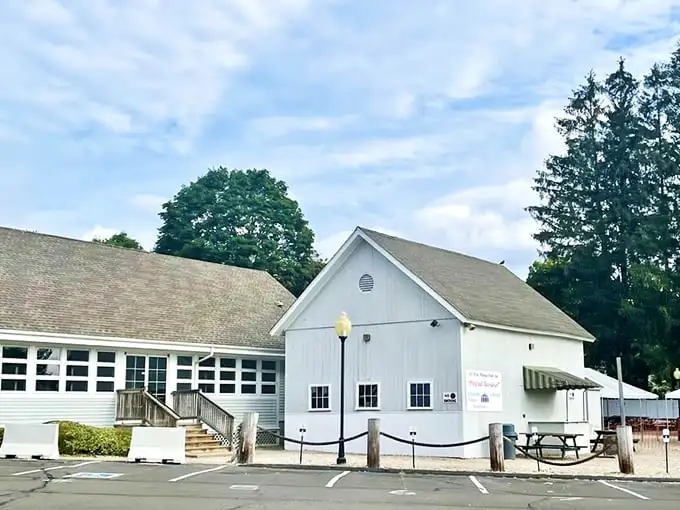 The classic white clapboard exterior of Lenny & Joe's stands like a beacon for seafood lovers—New England architecture that practically whispers "fresh catch inside."