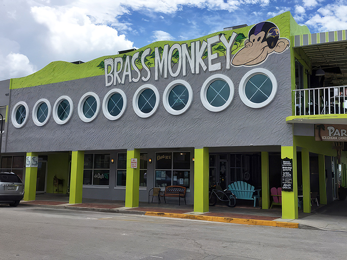 The sunshine-yellow exterior of Brass Monkey stands out like a beacon of culinary hope on St. Pete Beach, promising good times on both levels.