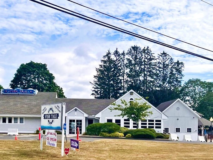 The classic white clapboard exterior of Lenny & Joe's stands like a beacon for seafood lovers—New England architecture that practically whispers "fresh catch inside."