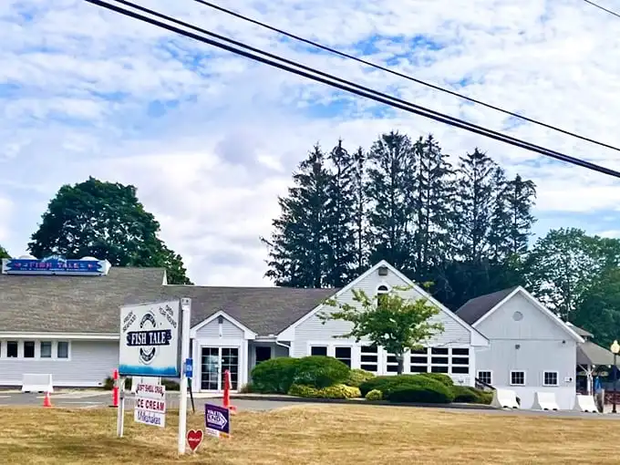 The classic white clapboard exterior of Lenny & Joe's stands like a beacon for seafood lovers—New England architecture that practically whispers "fresh catch inside."