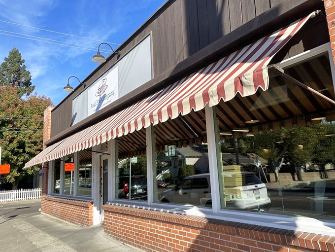 The red-and-white striped awning isn't just charming - it's nature's way of signaling "life-changing pie ahead," like a delicious warning system for your taste buds.