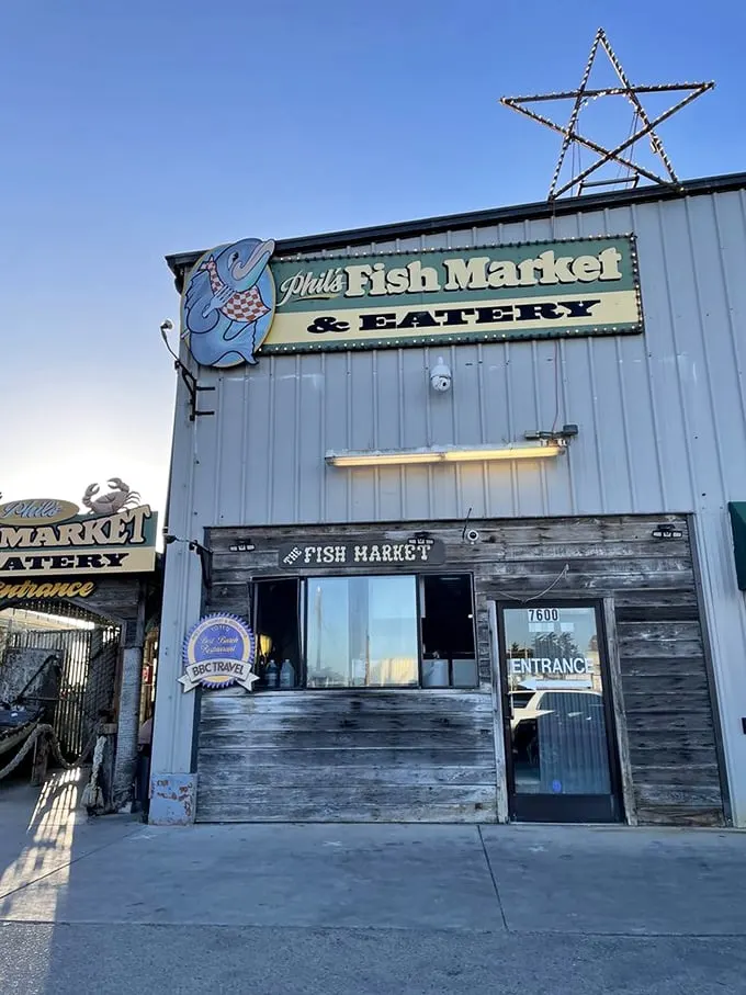 The unassuming blue exterior of Phil's Fish Market & Eatery stands like a salty sea captain – weathered, unpretentious, and hiding treasures within.