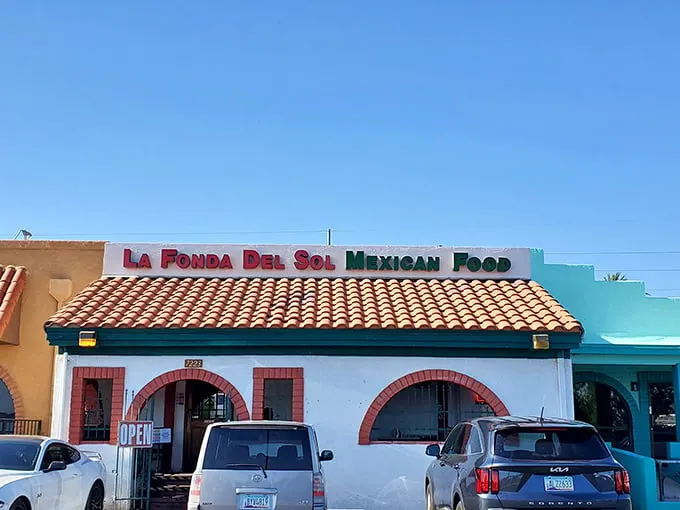 The unassuming entrance to flavor paradise. La Fonda Del Sol's charming exterior promises authentic Mexican cuisine behind those welcoming doors.
