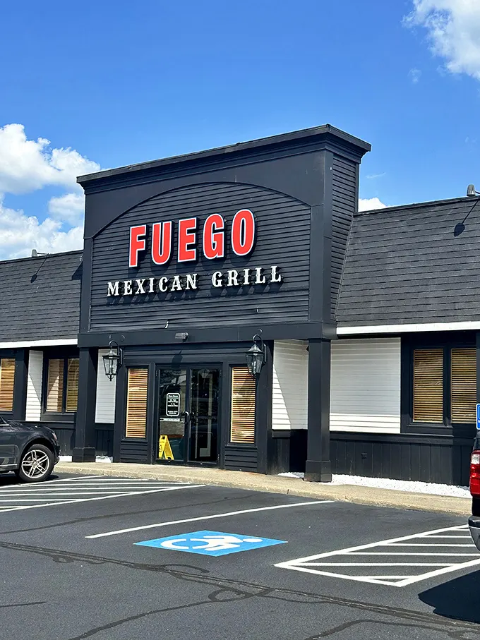 The understated exterior belies the flavor explosion waiting inside. Fuego's sleek black facade with bold red lettering makes a confident statement without the neon sombrero clichés.