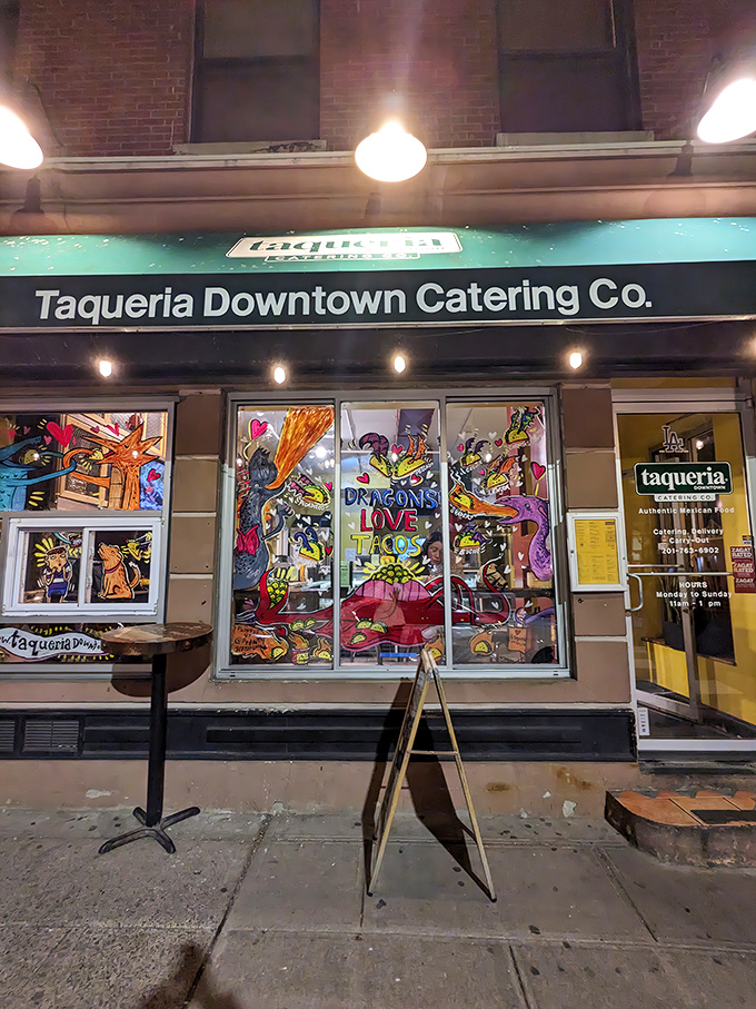 The unassuming green awning of Taqueria Downtown Catering Co. hides Jersey City's best-kept culinary secret. Like finding a diamond in your cereal box – unexpected but absolutely thrilling.