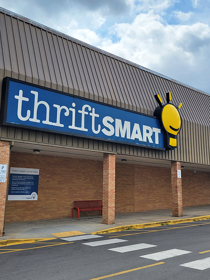 The familiar blue and yellow sign beckons like a lighthouse for bargain hunters, promising treasures within those unassuming brick walls.