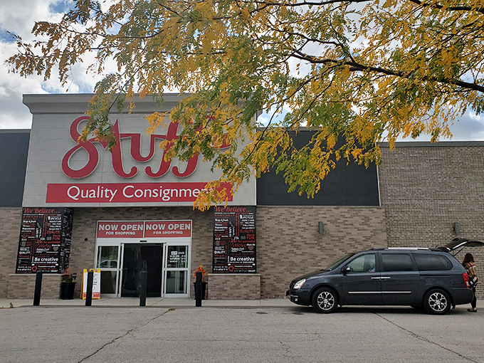 The iconic red Stuff Etc sign stands out like a beacon for bargain hunters, promising treasures within those brick walls.