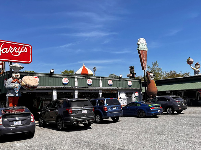 The roadside charm of Harry's comes complete with whimsical statues – including a chef pig holding a burger and that iconic ice cream cone beckoning hungry travelers.