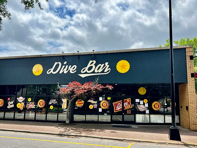 Basketball and beers – the adult version of a playground awaits at Dive Bar Hickory with NBA-themed arcade games and a unique beer token wall.
