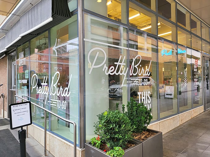 The sleek storefront of Pretty Bird beckons with its elegant cursive logo and minimalist design. Salt Lake City's hottest chicken joint doesn't need flashy gimmicks to draw you in.