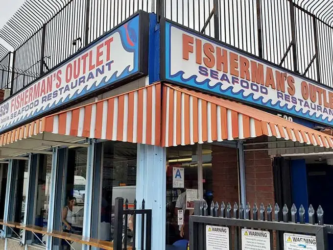 The red and white striped awning of Fisherman's Outlet stands like a beacon for seafood lovers in downtown LA's industrial district.