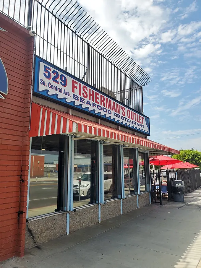 The red and white striped awning of Fisherman's Outlet stands like a beacon for seafood lovers in downtown LA's industrial district.