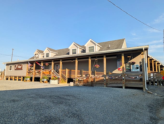 The quintessential coastal dining experience awaits on this weathered deck, where every table comes with a side of Delaware Bay breezes and waterfront tranquility.