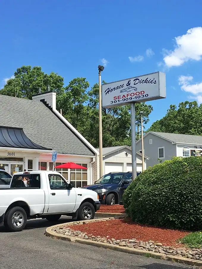 The unassuming white brick exterior of Horace & Dickies in Camp Springs hides culinary treasures that locals have been quietly celebrating for years.