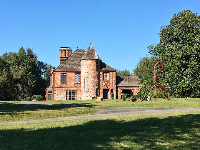 Redwall Castle stands proudly against the Maryland sky, its reddish-brown stonework and circular turret looking like it was plucked straight from a European countryside.