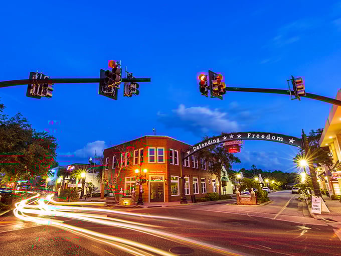 Dunedin's Main Street comes alive at twilight, where the iconic "Defending Freedom" arch welcomes visitors to a downtown that feels refreshingly un-Florida-like in all the best ways.