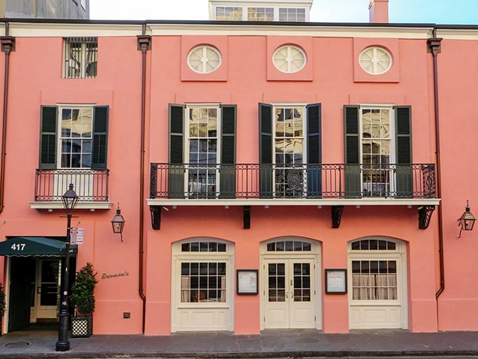 The pink façade of Brennan's stands out on Royal Street like a sophisticated Southern belle who knows she's turning heads—and doesn't mind one bit.