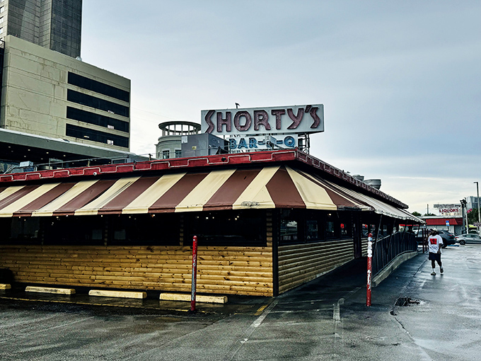 The iconic red and white striped awning of Shorty's has been Miami's smoke signal to barbecue lovers since 1951. A landmark that's survived hurricanes, fires, and food trends.