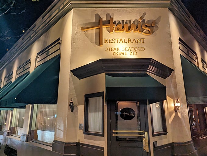 Harris' Restaurant glows with old-school charm at dusk, those signature green awnings beckoning like a carnivore's lighthouse in the San Francisco fog.