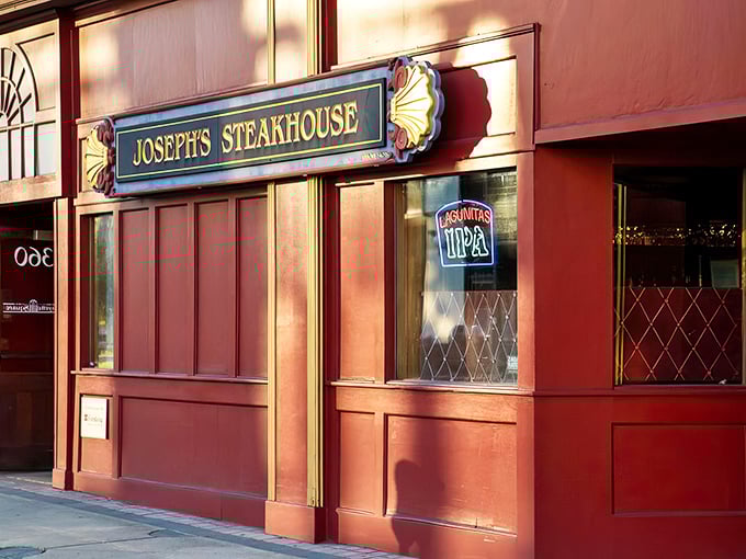 The unassuming brick façade of Joseph's Steakhouse hides culinary greatness like Clark Kent's glasses hide Superman. Classic signage promises old-school excellence.
