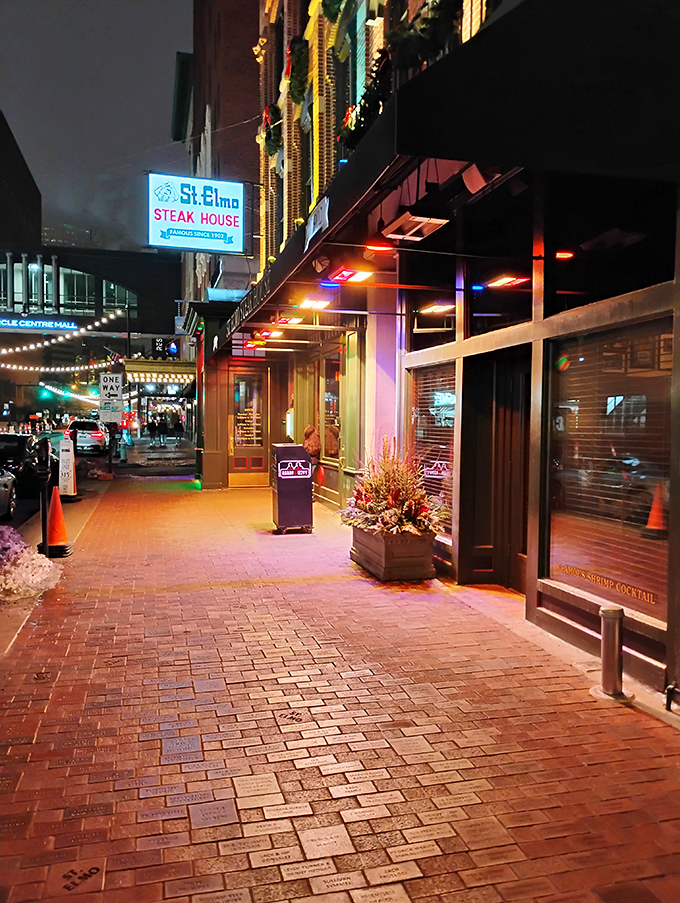 The historic brick façade of St. Elmo Steak House stands proudly on Illinois Street, a culinary landmark that's been tempting Indianapolis carnivores for generations.