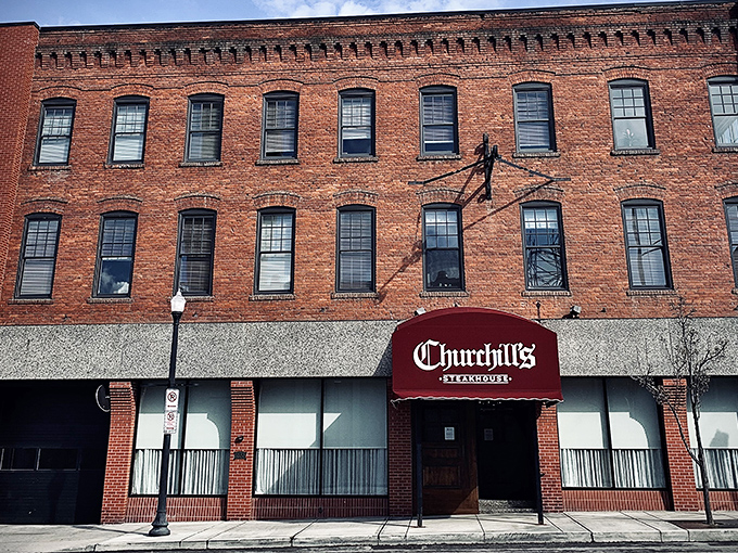 Churchill's bold red awning against Spokane's iconic steam stacks isn't just a sign—it's a beacon calling to serious carnivores across the Inland Northwest. 