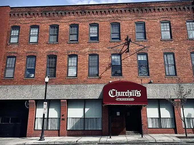 Churchill's bold red awning against Spokane's iconic steam stacks isn't just a sign—it's a beacon calling to serious carnivores across the Inland Northwest.