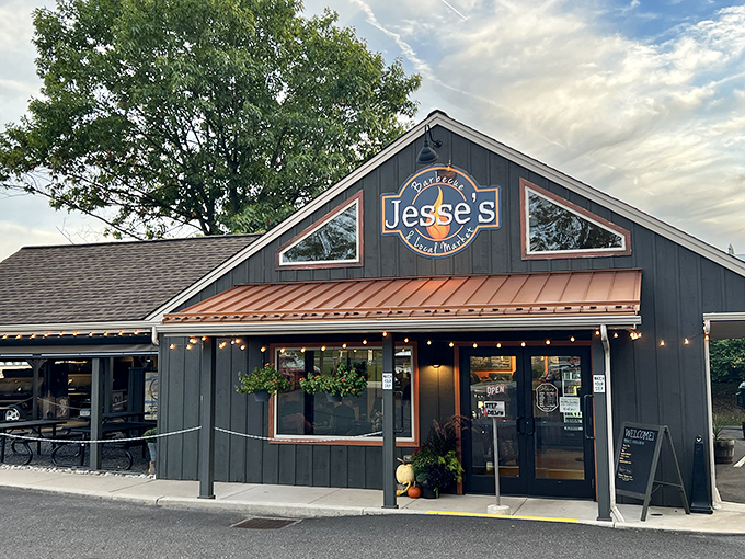 The barbecue promised land beckons with its simple wooden exterior and copper accents—proof that the best smokehouses focus on meat, not architectural flourishes.
