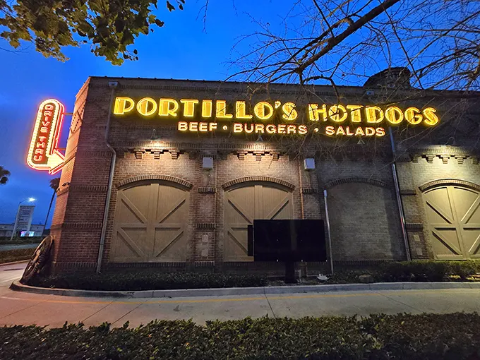 The neon-drenched exterior of Portillo's glows like a beacon of Midwestern comfort food in the Southern California night. Chicago never looked so good in California.
