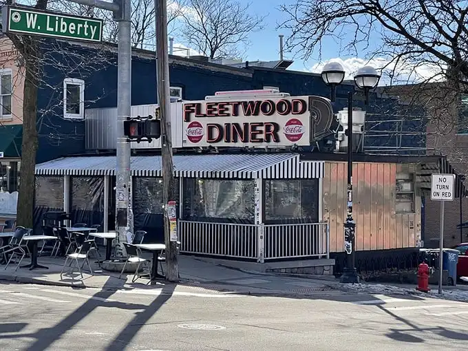 The iconic Fleetwood Diner sign glows like a beacon for hungry souls, promising comfort food and a slice of Ann Arbor history.