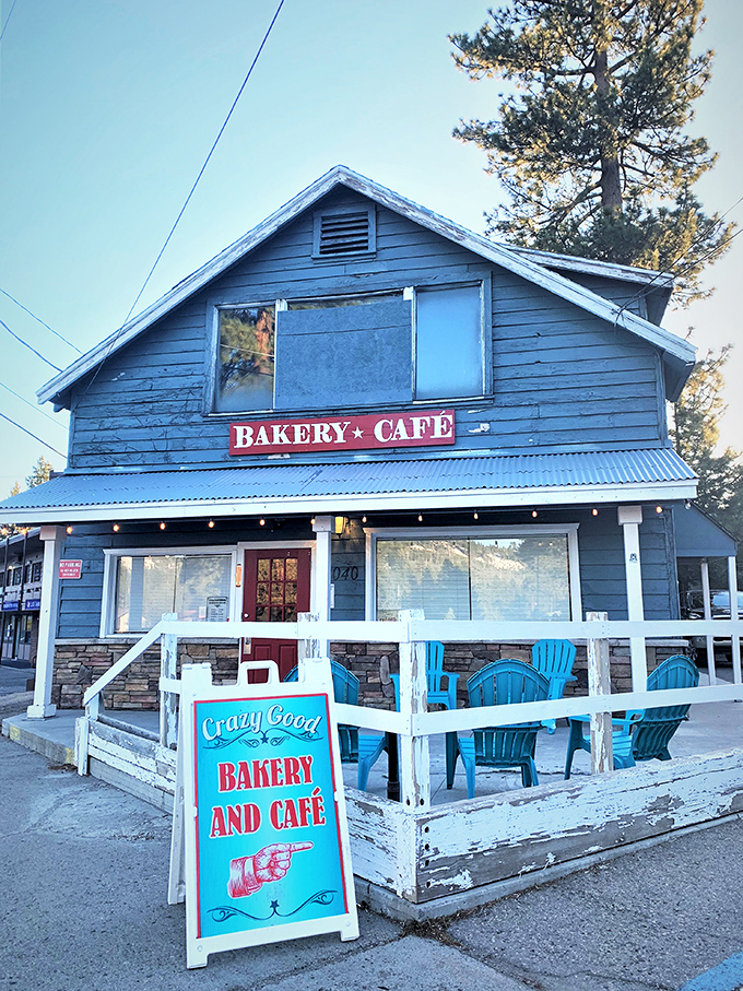 The blue clapboard exterior with turquoise Adirondack chairs isn't just mountain-town charming—it's a beacon for carb enthusiasts seeking their next sugar high.