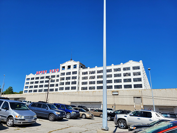 The imposing white fortress of Super Flea stands against a brilliant blue Missouri sky – a siren call to bargain hunters and collectors alike.