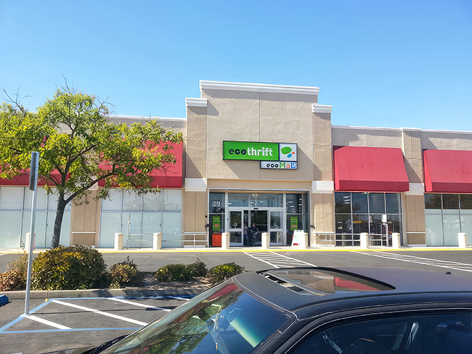 The bright green Eco Thrift sign beckons like a lighthouse for bargain hunters navigating the sea of retail prices.