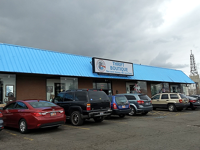 The iconic blue roof of The Other Side Thrift Boutique stands out like a beacon for treasure hunters across Salt Lake City.
