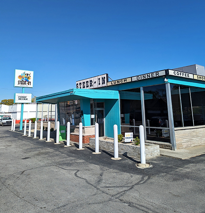 The turquoise-trimmed time machine beckons from East 10th Street, promising comfort food that actually comforts and conversations that matter.