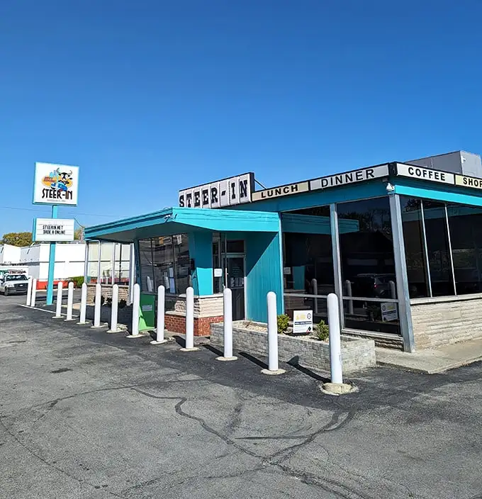 The turquoise-trimmed time machine beckons from East 10th Street, promising comfort food that actually comforts and conversations that matter.