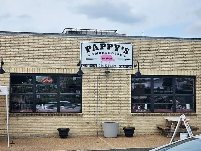 The unassuming yellow brick exterior of Pappy's Smokehouse – where BBQ pilgrims willingly make the journey for meat nirvana.
