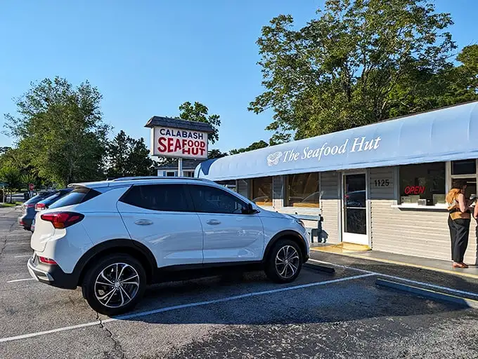 The blue awning says it all: simple, unpretentious, and housing seafood treasures that would make Neptune himself swim upstream for a taste.