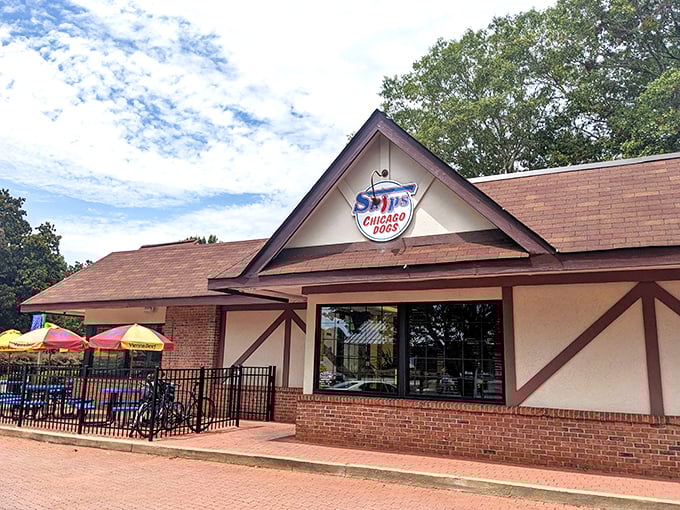 The Tudor-style exterior of Skip's Chicago Dogs stands as a welcoming beacon of Midwest flavor in the heart of Avondale Estates.