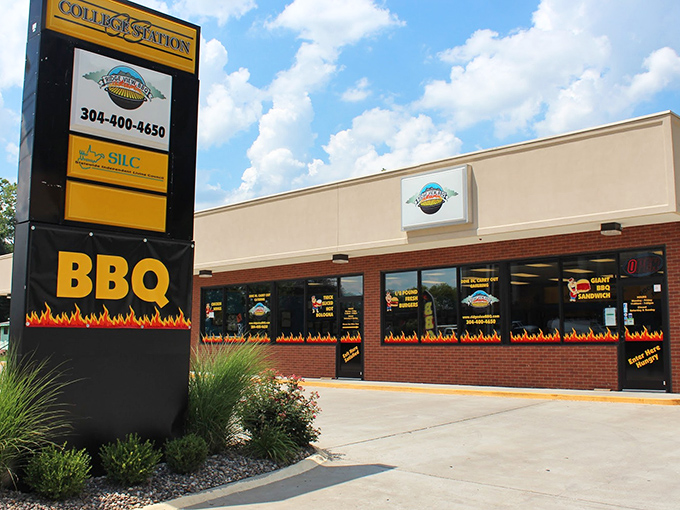 The flames painted along the storefront aren't just decoration—they're a warning to your diet plans. Ridge View BBQ's exterior promises smoky delights within.