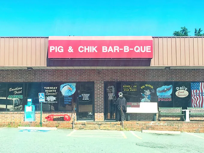 The bright red sign beckons like a barbecue lighthouse in a sea of hunger. No fancy frills here—just the promise of smoky delights waiting inside.