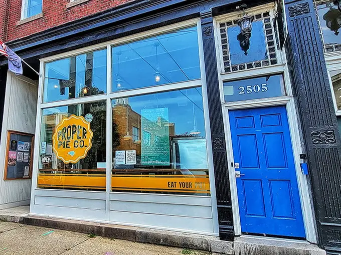 The blue door beckons like a portal to pie paradise. Proper Pie Co.'s charming storefront in Richmond's Church Hill neighborhood promises delicious adventures within.