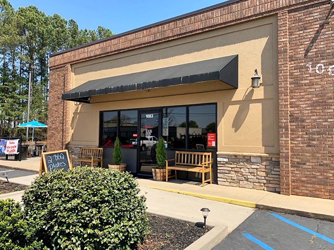 Historic brick façade that houses sandwich magic inside—like finding the Willy Wonka factory of deli meats in downtown Grapevine.