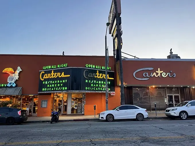 The neon-lit promise of "OPEN ALL NIGHT" isn't just signage—it's a beacon of hope for the hungry at 3 AM when good decisions are optional but great sandwiches are mandatory.