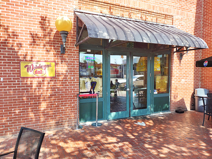 Historic brick façade that houses sandwich magic inside—like finding the Willy Wonka factory of deli meats in downtown Grapevine.