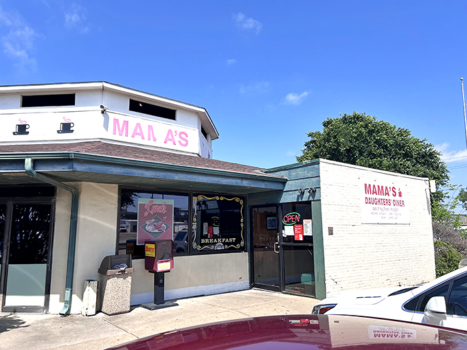 The unassuming exterior of Mama's Daughters' Diner promises what fancy restaurants can't – honest food that hugs your soul from the inside out.