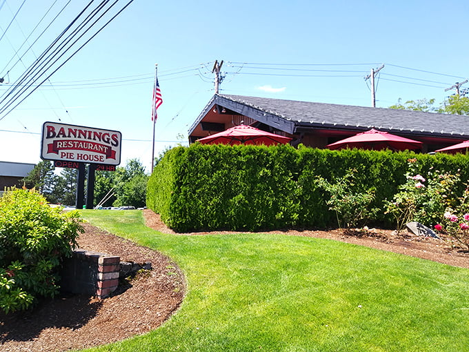 The classic roadside charm of Banning's welcomes hungry travelers with its pitched roof, modest signage, and well-kept landscaping—comfort food's natural habitat.